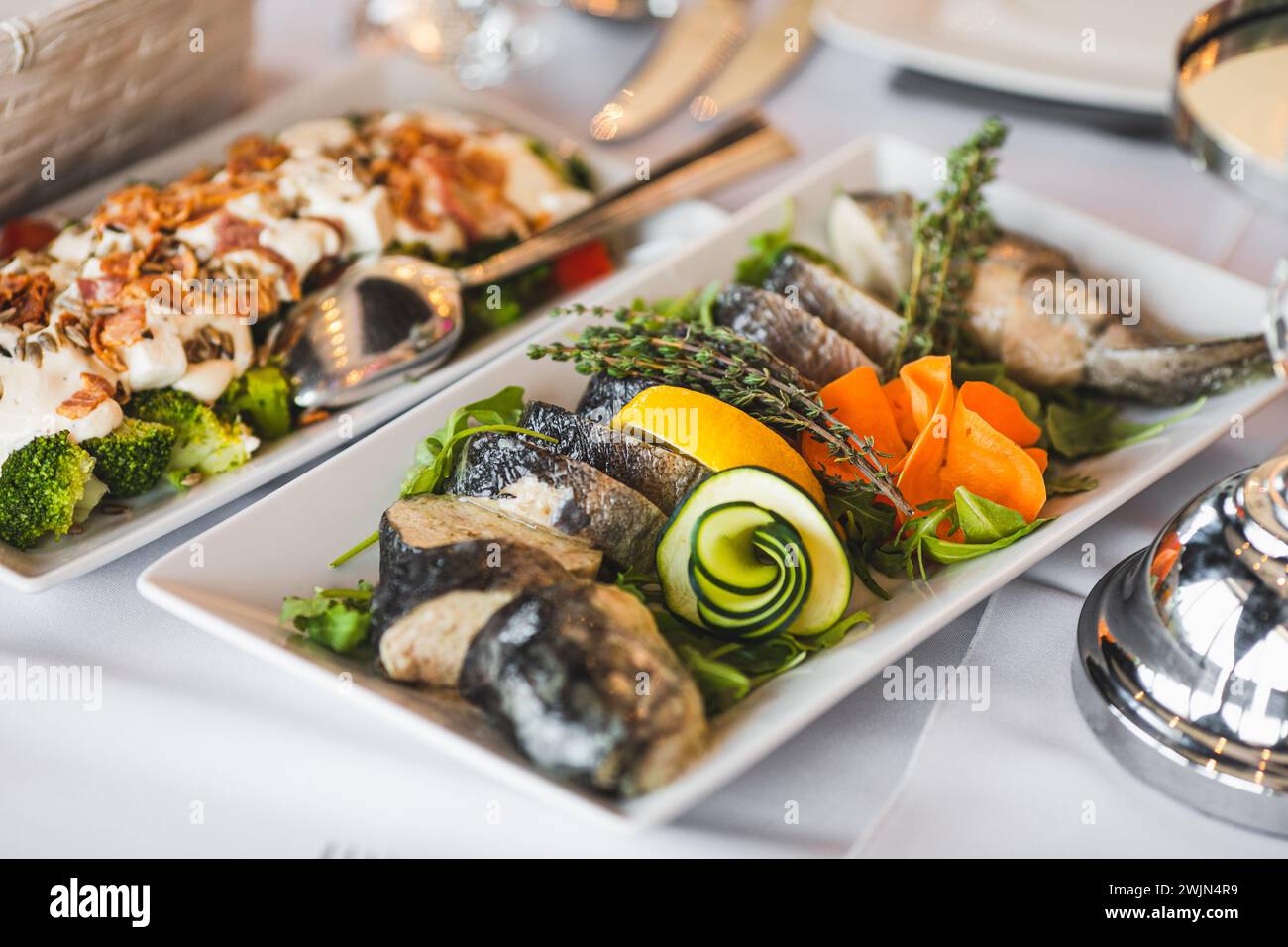 Menu for holidays, weddings. Rectangular plates with cold fish snacks ...