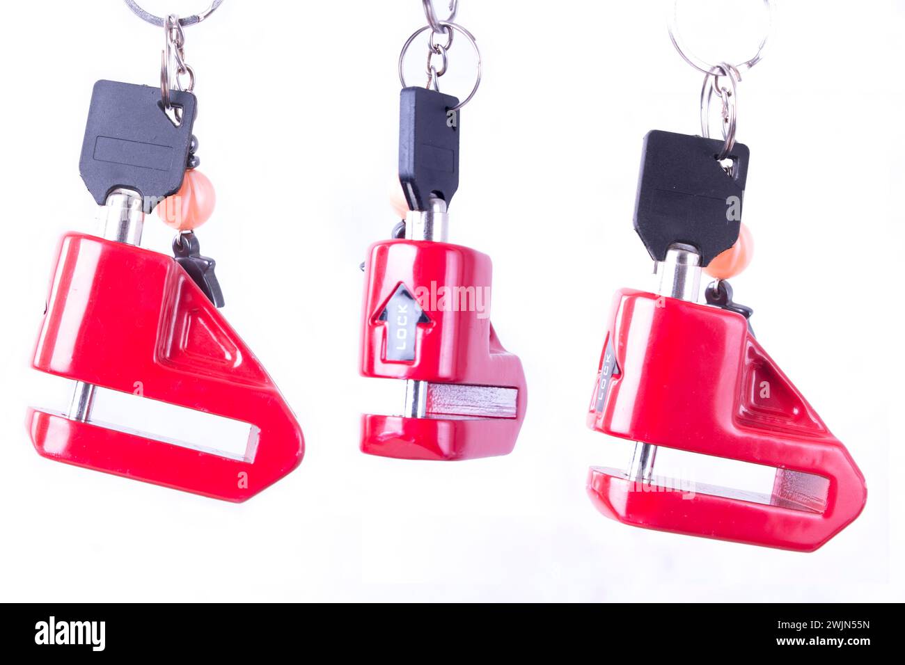 red disc locks and keys, motor vehicle keys. clipping path Stock Photo ...