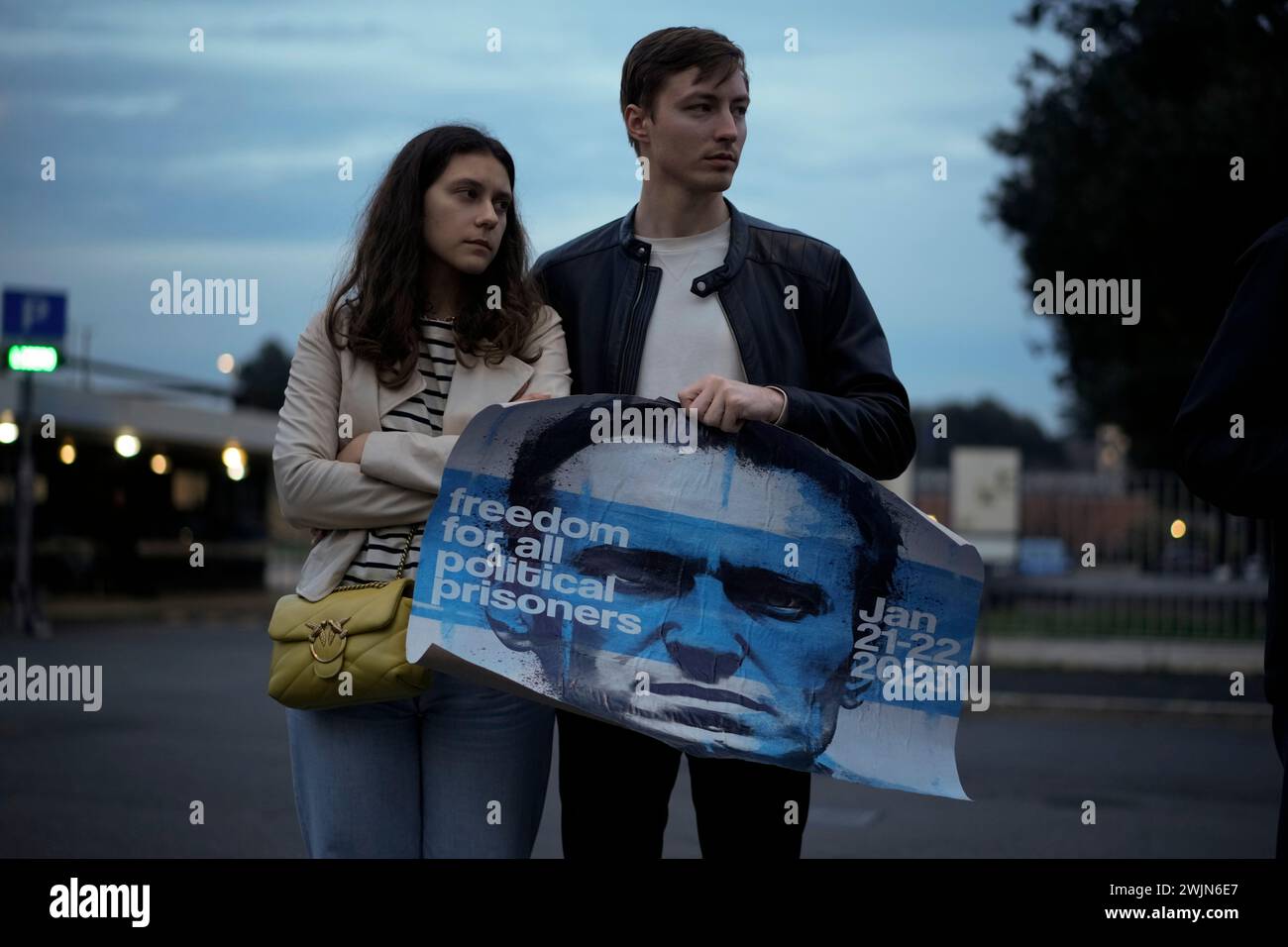 People hold posters of Russian opposition leader Alexei Navalny during ...