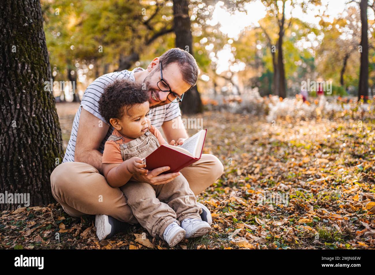 Fatherly nurturing hi-res stock photography and images - Alamy