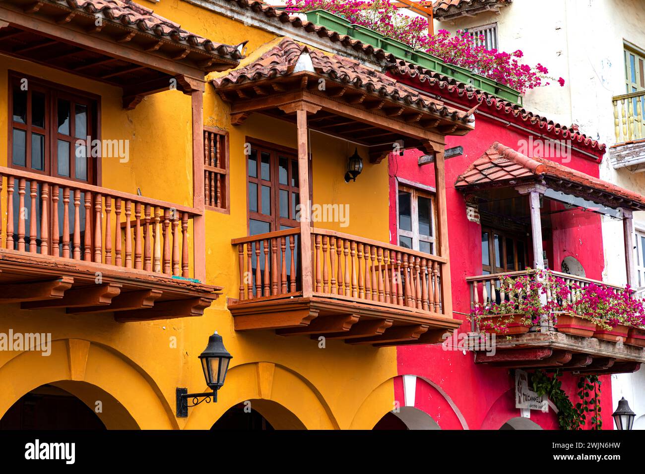 Street with colonial buildings in the Old Town of Cartagena Colombia ...