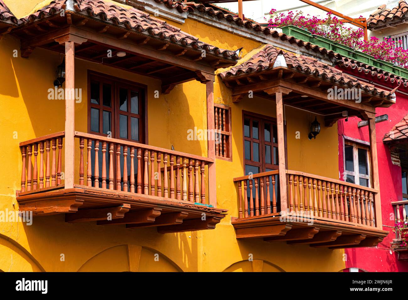 Street with colonial buildings in the Old Town of Cartagena Colombia ...