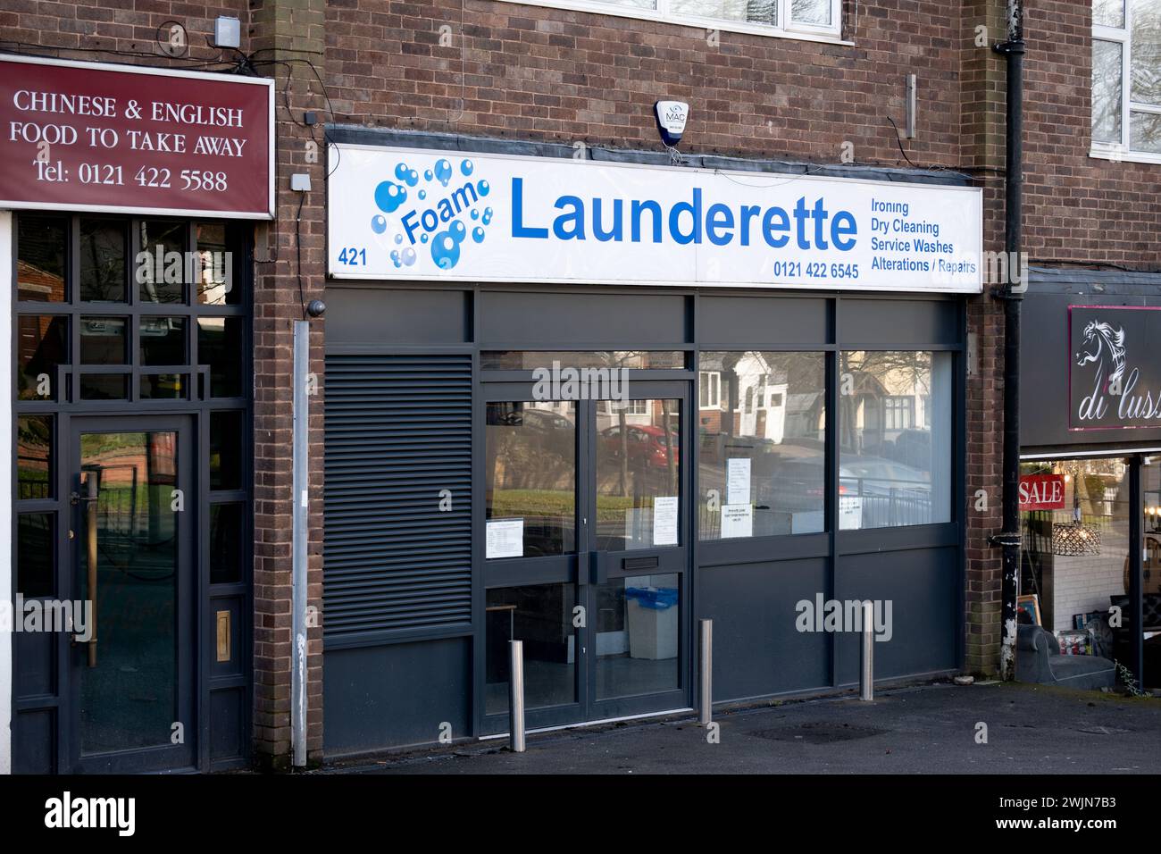 A Launderette in Quinton, West Midlands, England, UK Stock Photo - Alamy