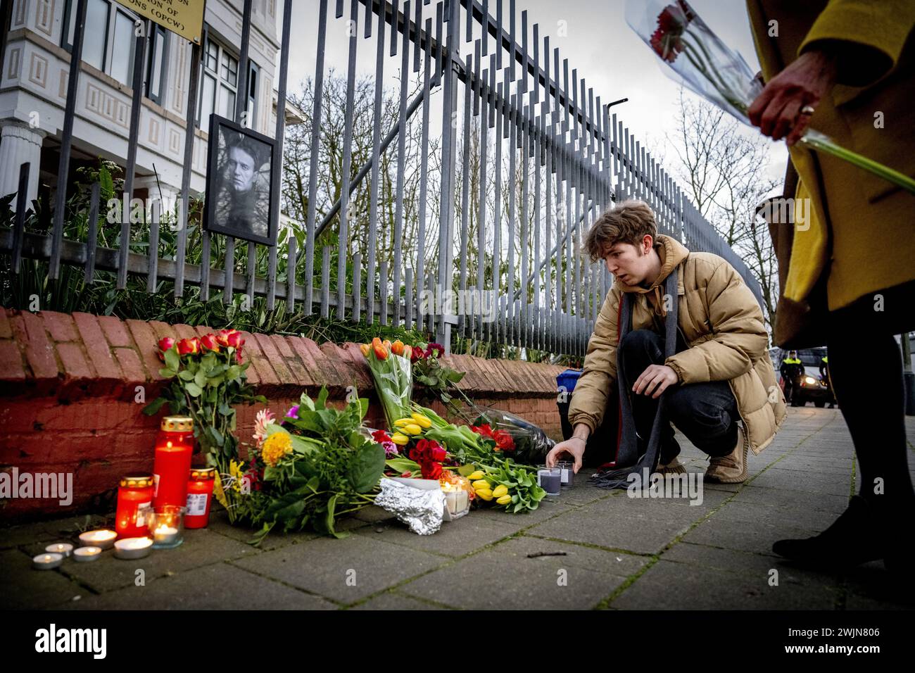 THE HAGUE - People gather at the Russian embassy in The Hague to hold a ...