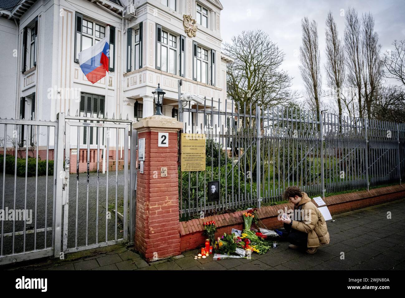 THE HAGUE - People gather at the Russian embassy in The Hague to hold a ...