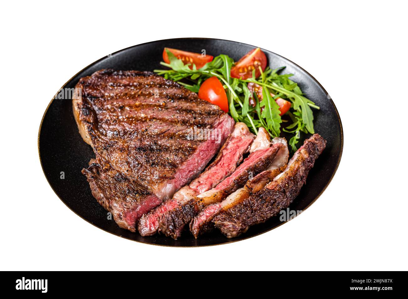 Barbecue grilled and sliced wagyu Rib Eye beef meat steak on a plate ...