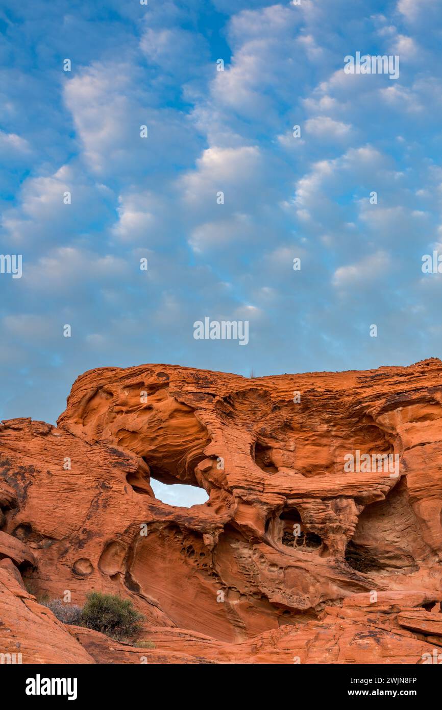 An unnamed natural arch in the eroded Aztec sandstone of Valley of Fire ...