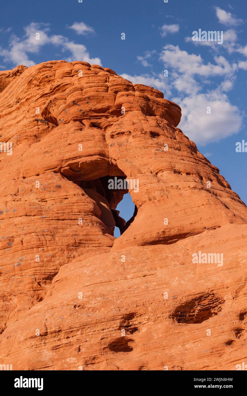 An unnamed natural arch in the eroded Aztec sandstone of Valley of Fire ...