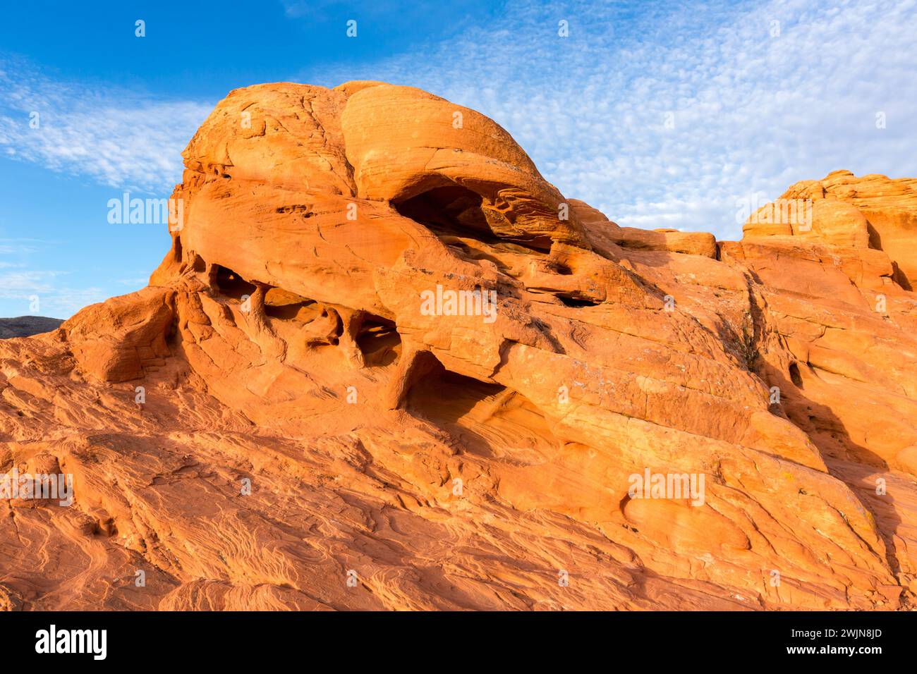 An unnamed natural arch in the eroded Aztec sandstone of Valley of Fire ...