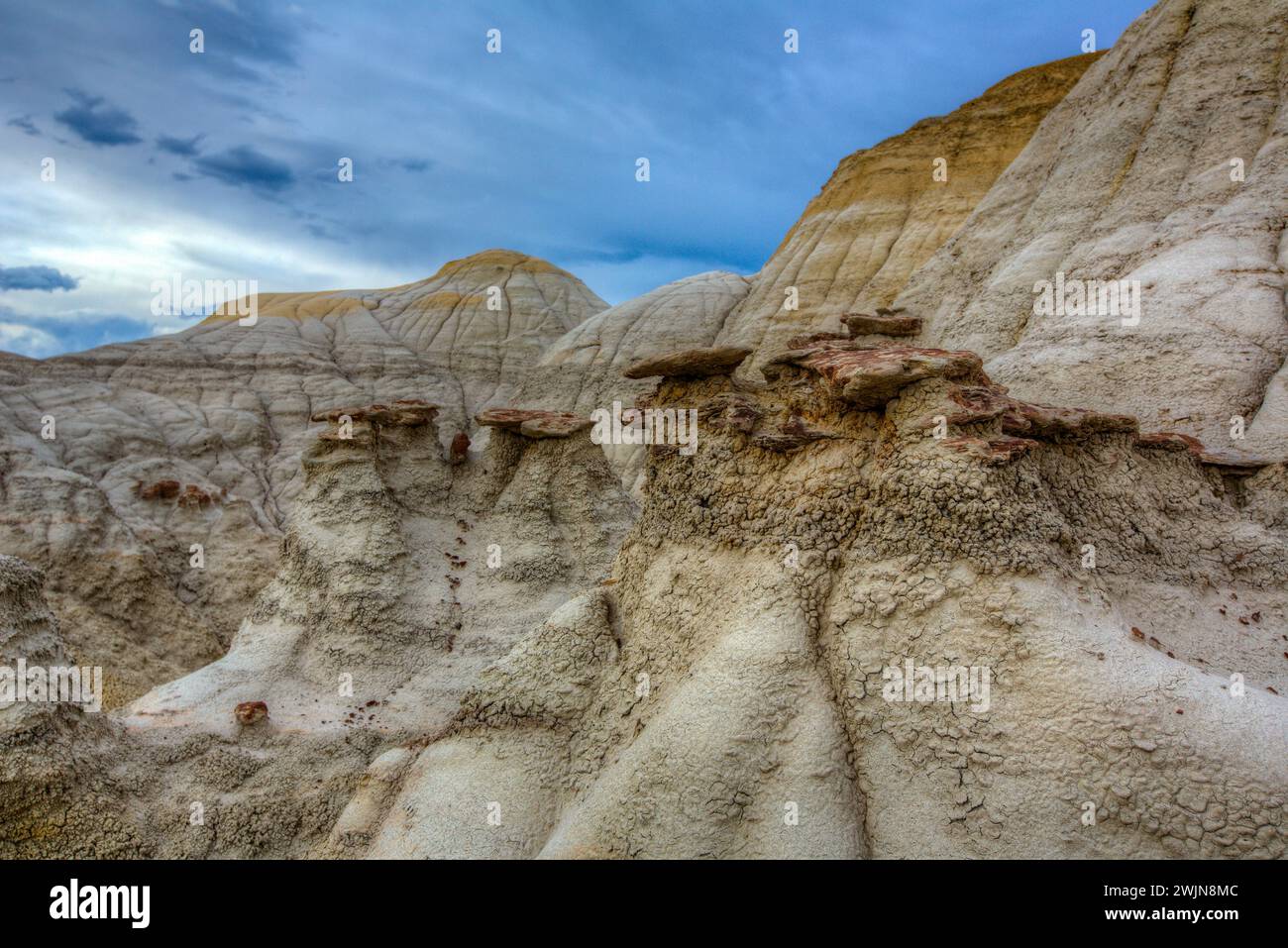 Bizarre landscape of colorful eroded clay hills in the badlands in the ...