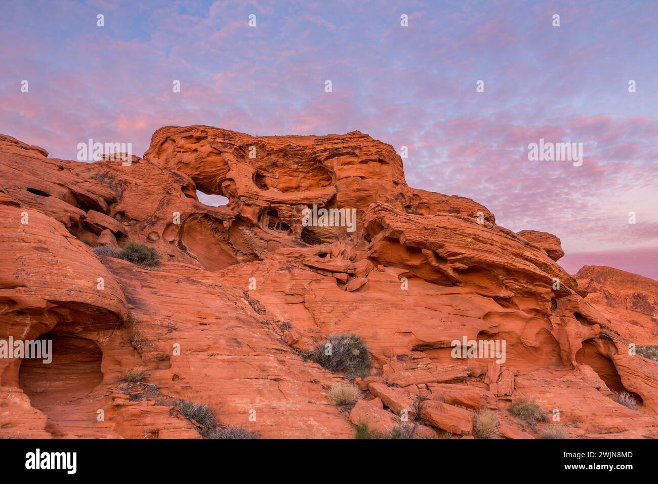 An unnamed natural arch in the eroded Aztec sandstone of Valley of Fire ...