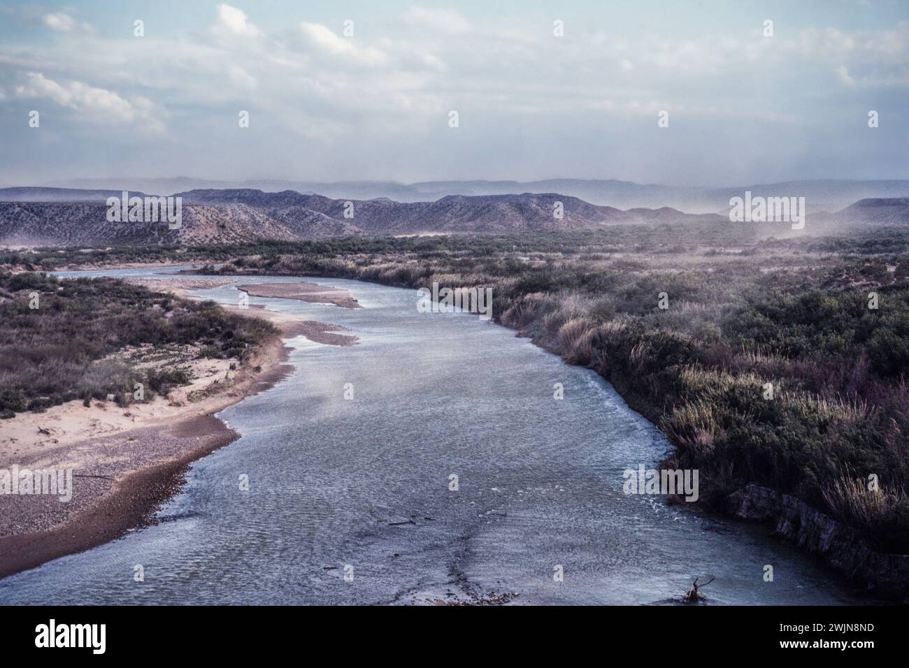 A wind storm blows over the Rio Grande River in Big Bend National Park ...