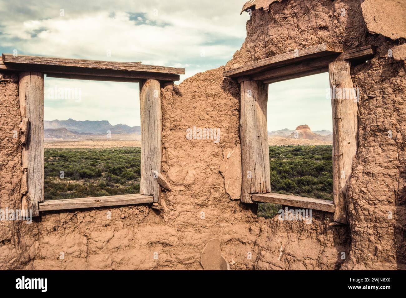 The windows of an old ruin at Hot Springs frames the desert landscape ...