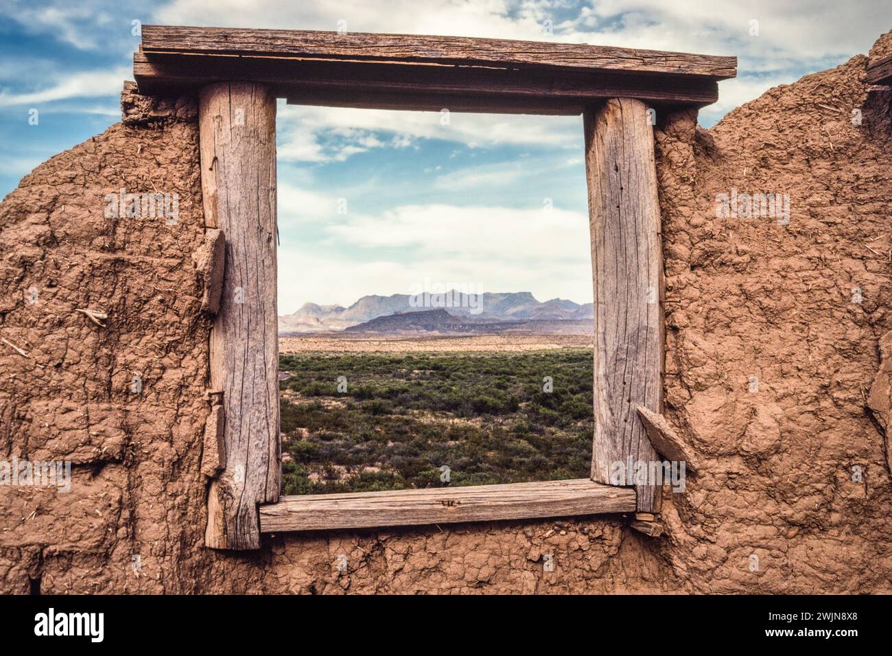 The window of an old ruin at Hot Springs frames the desert landscape in ...
