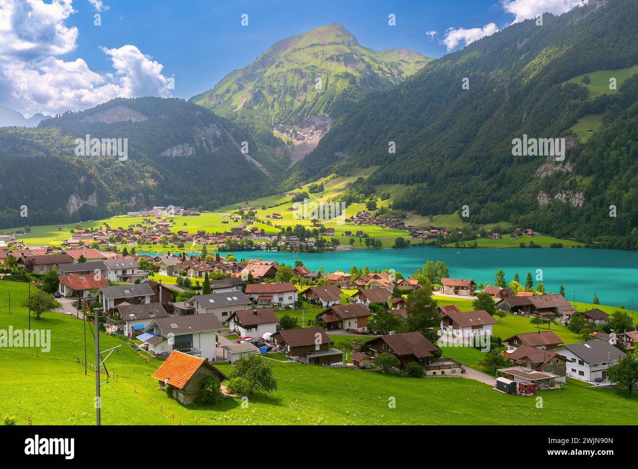 Lake Lungernsee and swiss village Lungern, canton of Obwalden ...
