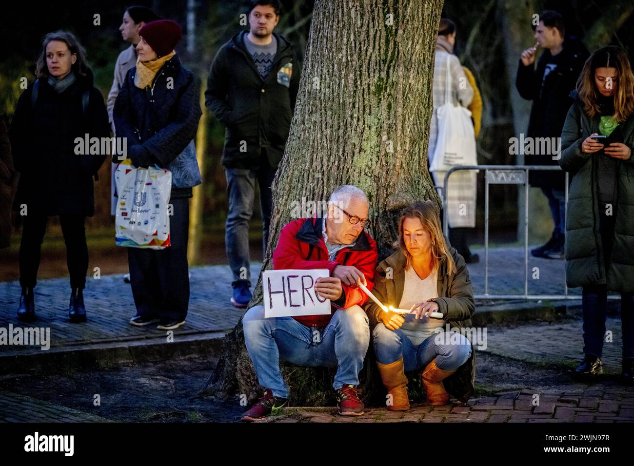 THE HAGUE - People gather at the Russian embassy in The Hague to hold a ...