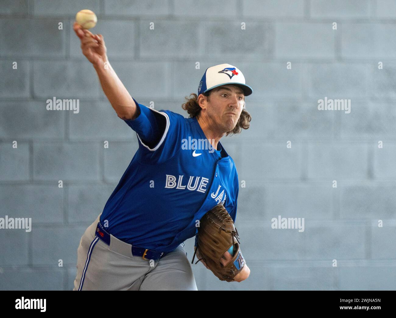 Toronto Blue Jays pitcher Kevin Gausman pitches during baseball spring training in Dunedin, Fla ...