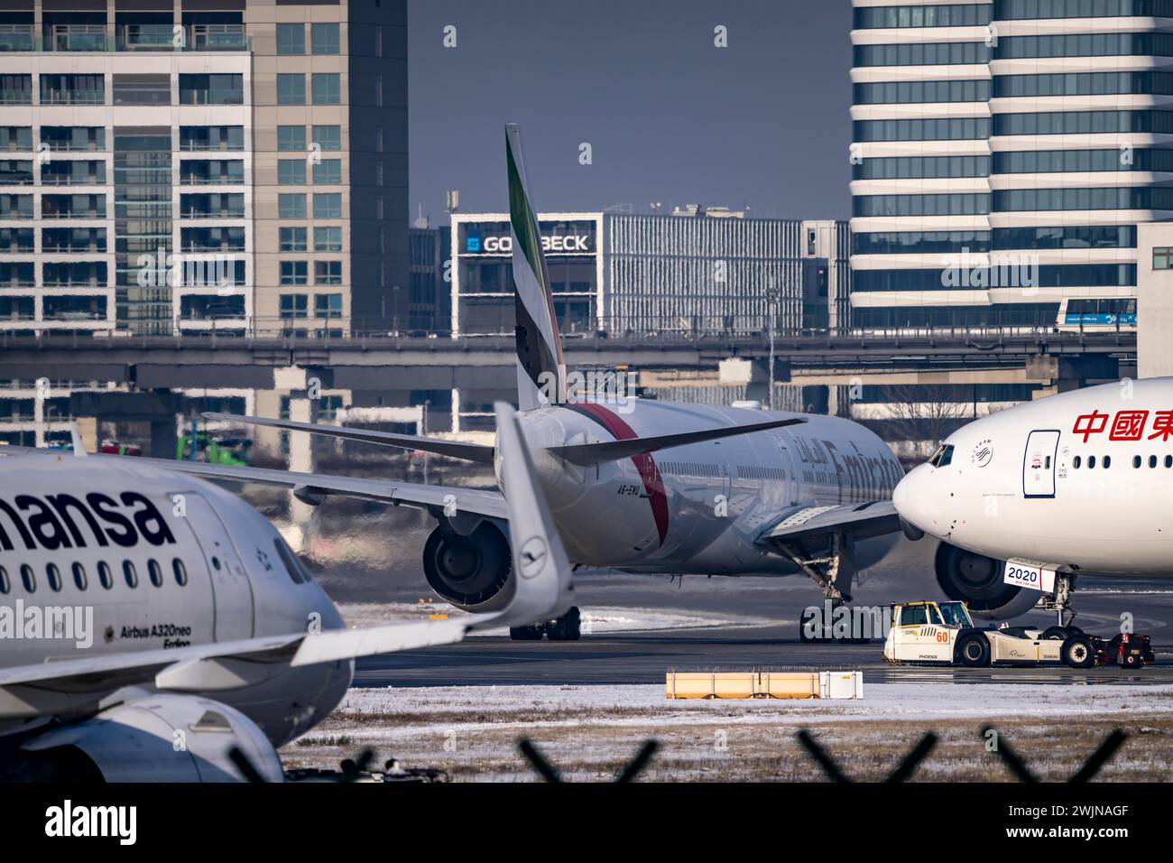 Aircraft on the taxiway at Frankfurt FRA Airport, Fraport, in winter ...