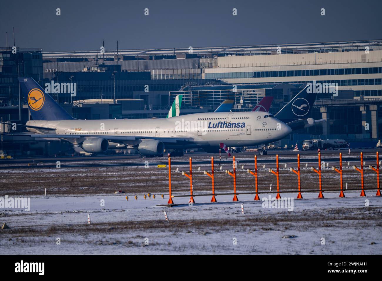 Aircraft on the taxiway at Frankfurt FRA airport, Fraport, in winter ...
