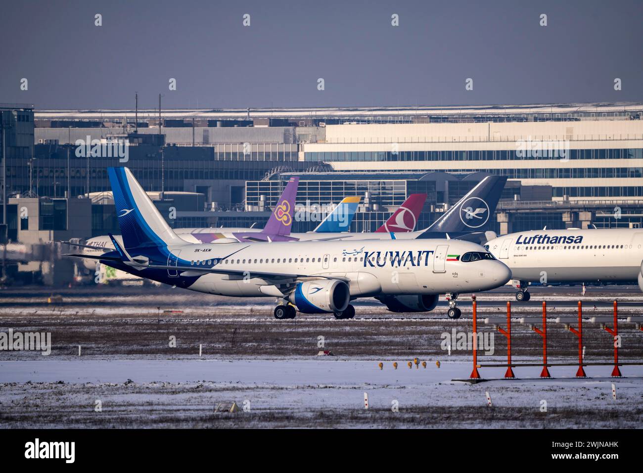Aircraft on the taxiway at Frankfurt FRA airport, Fraport, in winter ...
