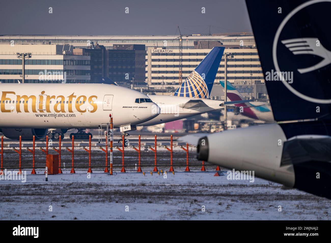 Aircraft on the taxiway at Frankfurt FRA Airport, Fraport, in winter, Hesse, Germany Stock Photo ...