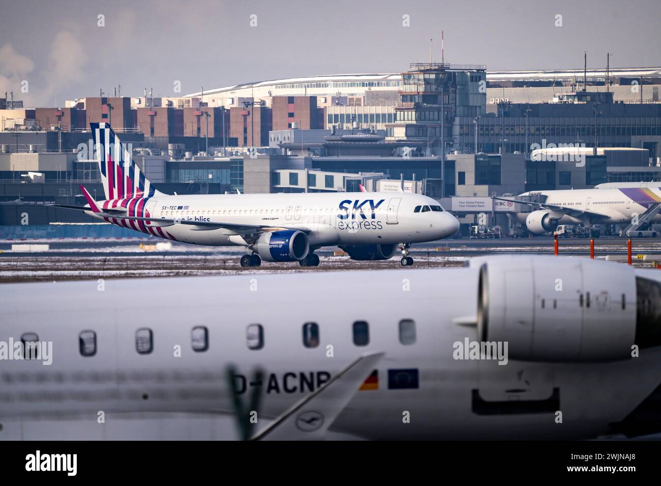 Aircraft on the taxiway at Frankfurt FRA Airport, Fraport, in winter ...