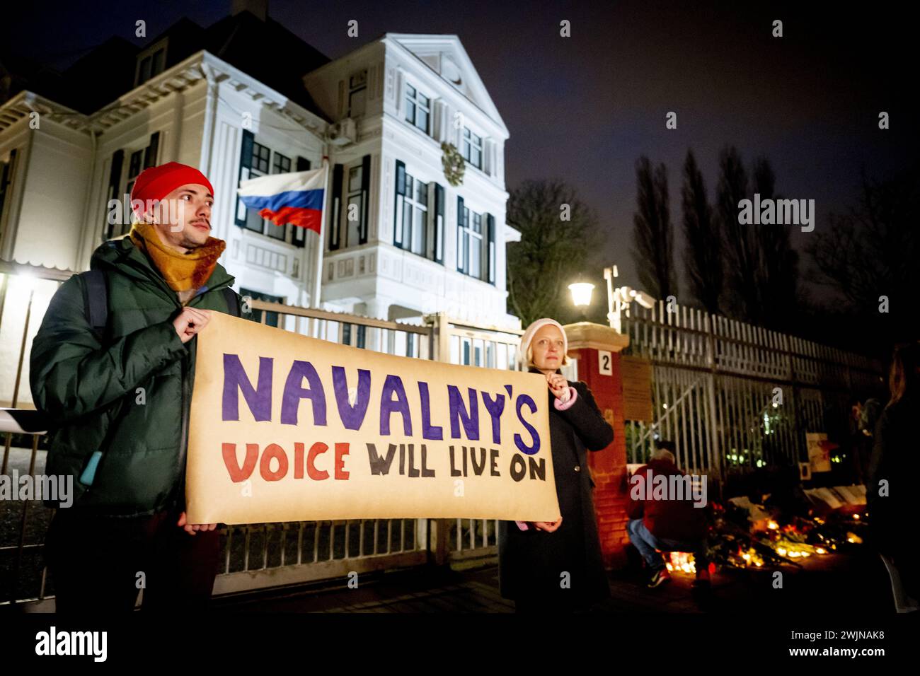 THE HAGUE - People gather at the Russian embassy in The Hague to hold a ...