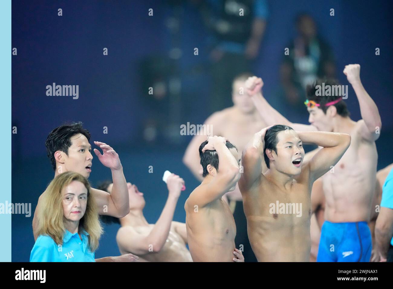 Members of South Korea team react after competing in the men's 4x200m ...