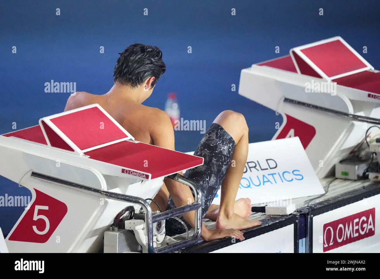 Hwang Sun-woo of South Korea sits after competing in the men's 4x200m ...