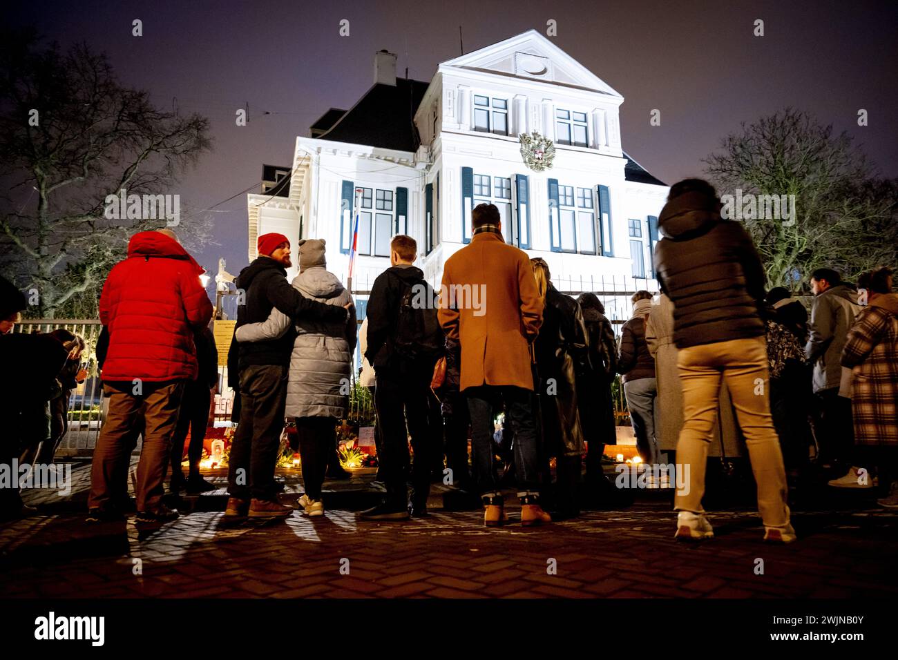 THE HAGUE - People gather at the Russian embassy in The Hague to hold a ...