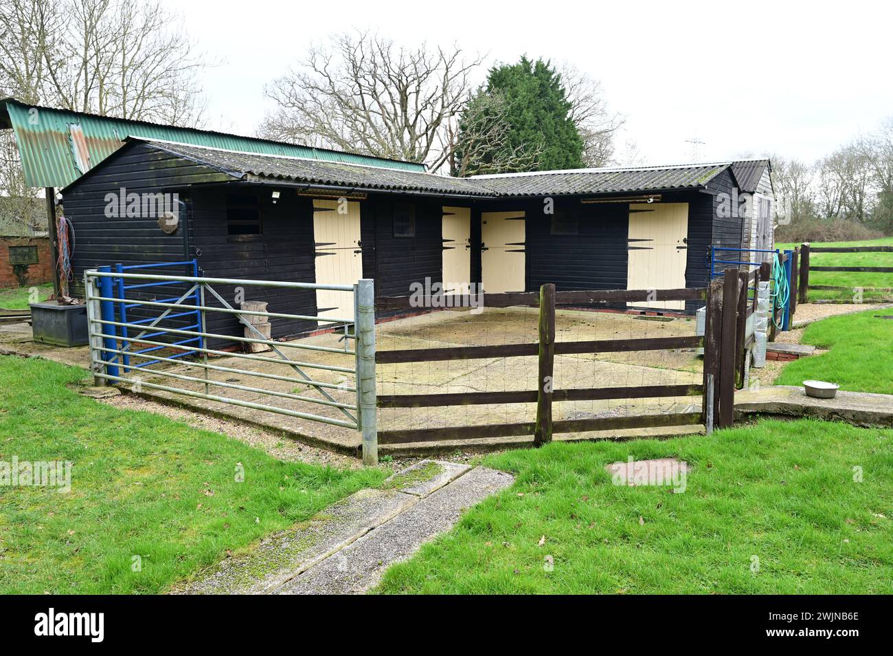 Stables and a Stables yard for horses in the UK Stock Photo - Alamy