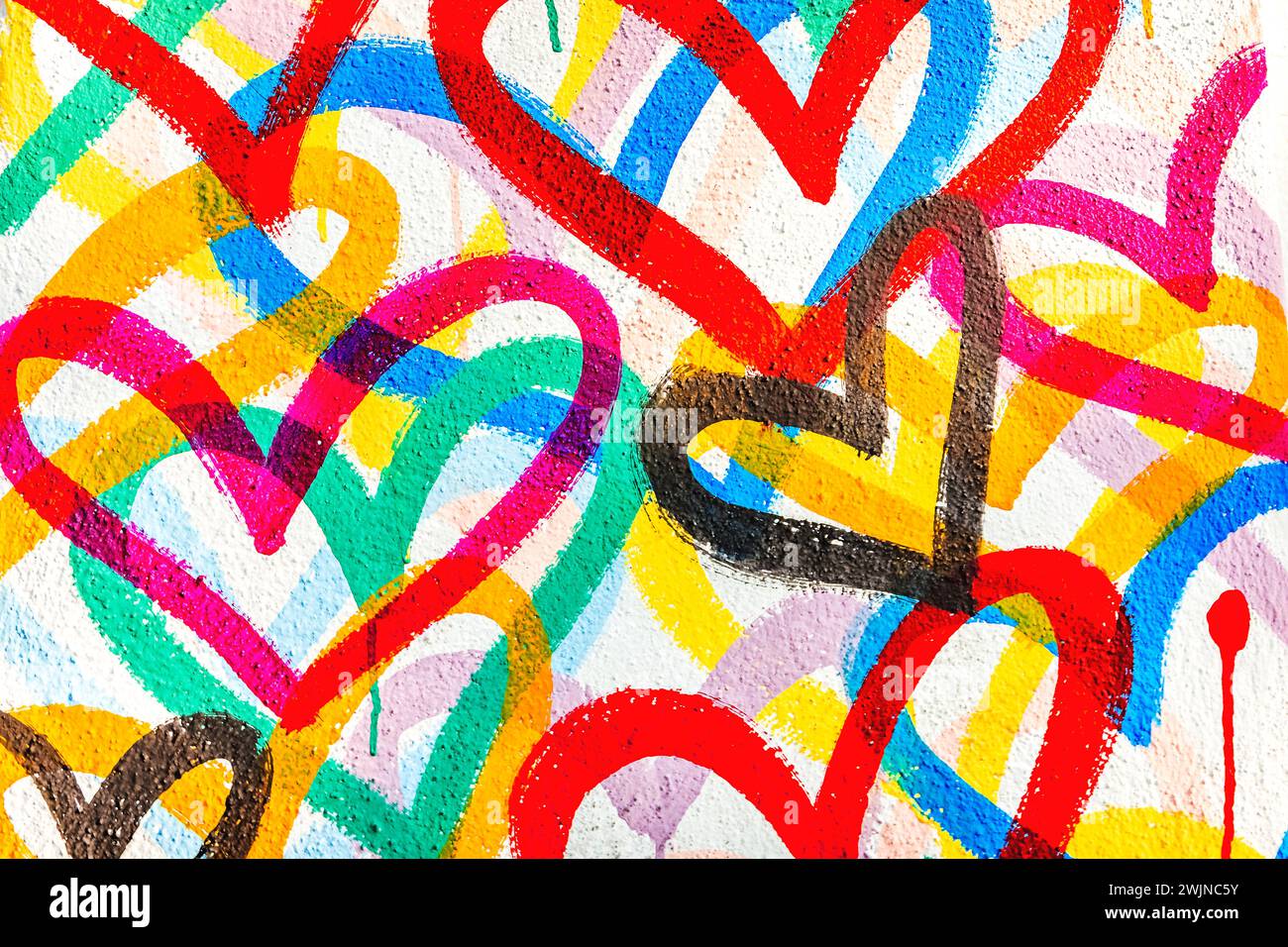 an artistic street art painting of colorful hearts Stock Photo - Alamy