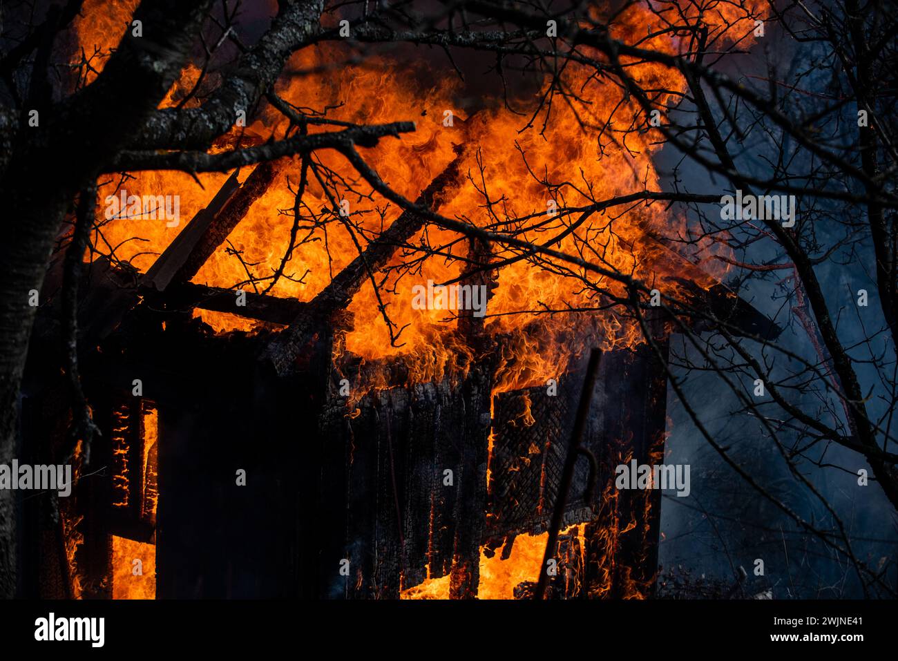 Fire home. House fire. Burning building. Open flames. Burning house. Single family detached home ...