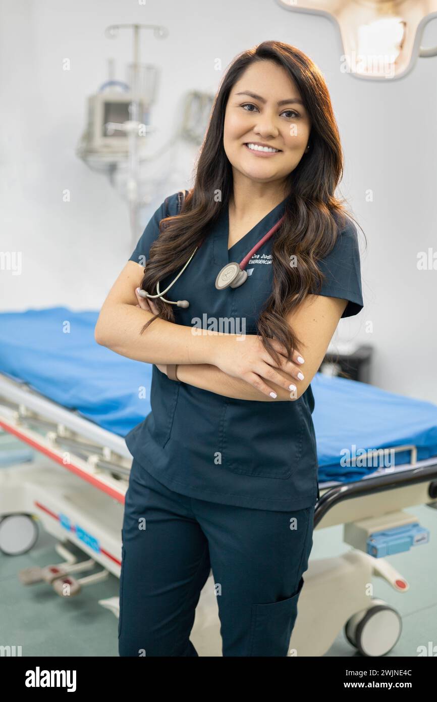 interior of a clinic equipped with stretchers, female doctor wears a ...
