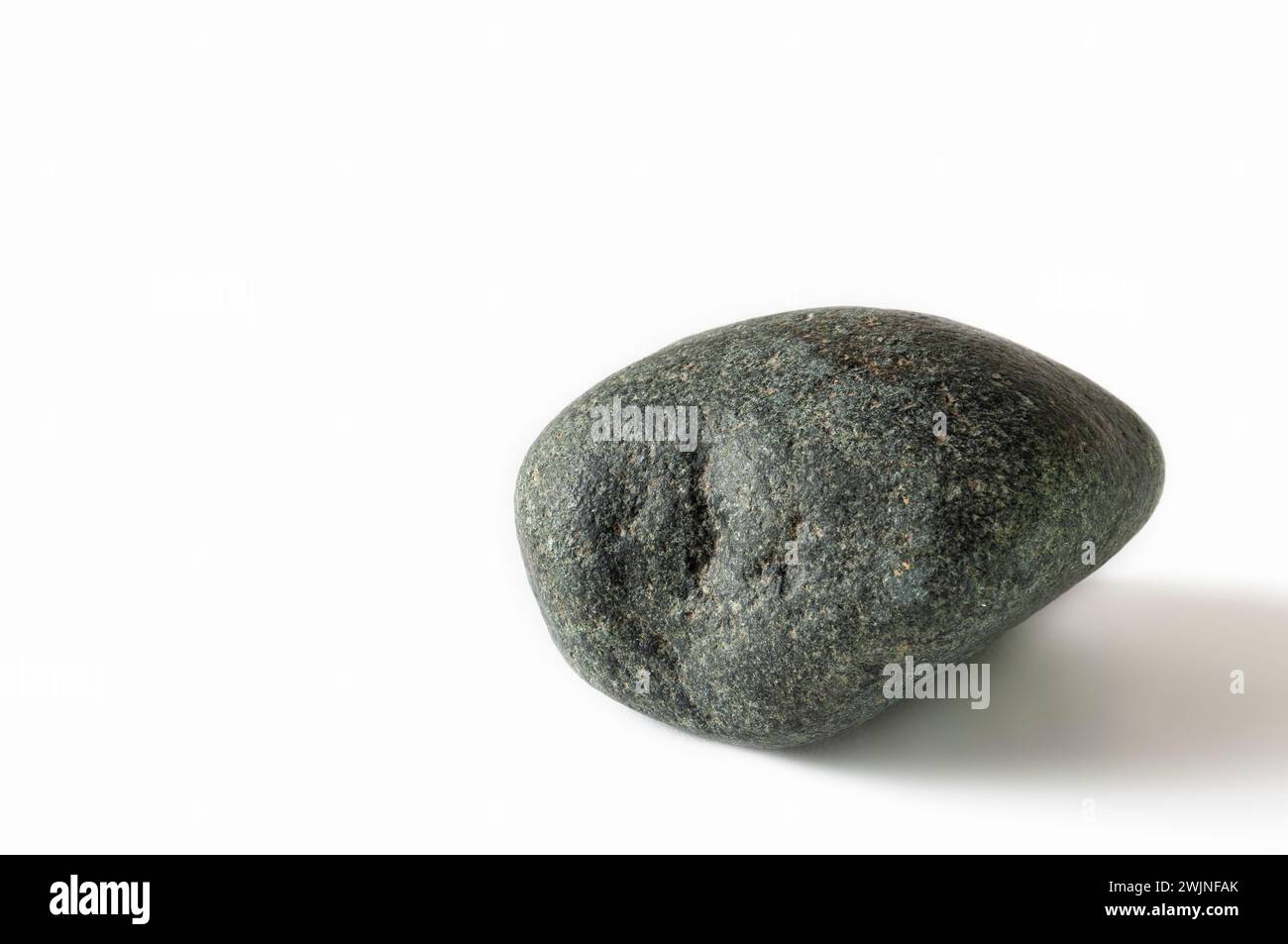 Dark gray stone from the bottom of the sea on a white background Stock ...