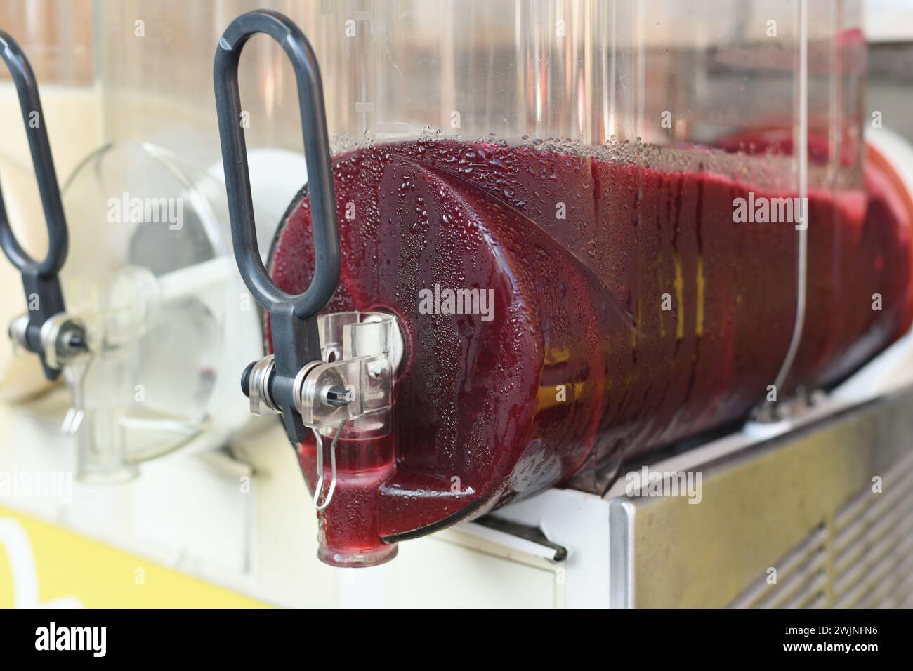 Ice granite containers Summer drink Juice device Stock Photo - Alamy