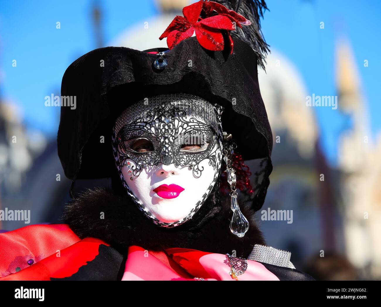 Venice, VE, Italy - February 13, 2024: masked person with lipstick and ...