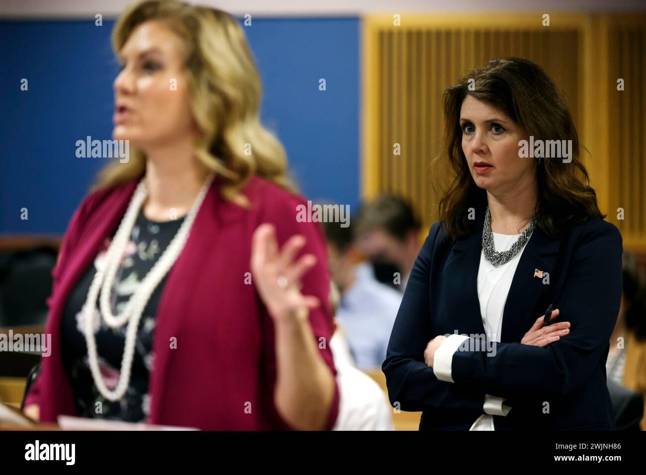 Attorney Anna Cross, right, who is representing the Fulton County ...