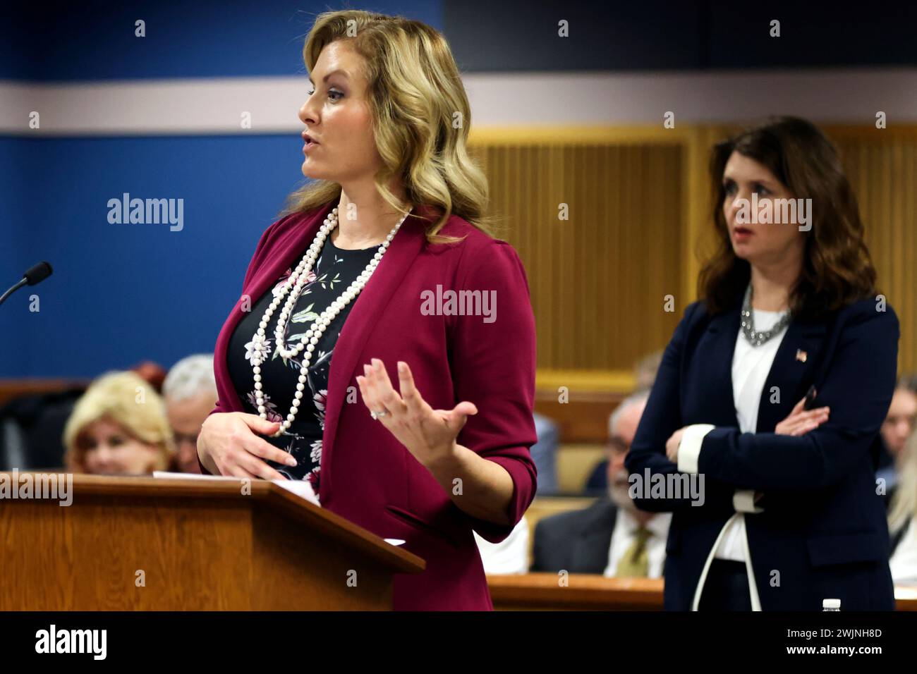 Attorney Ashleigh Merchant, left, who represents defendant Michael ...