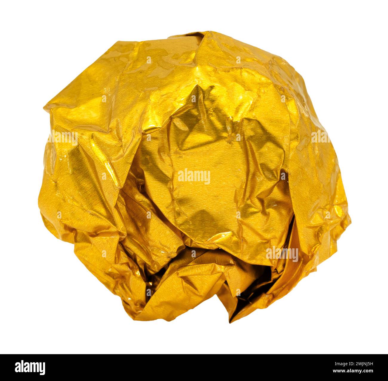 A lump or ball of crumpled yellow golden foil on a white background ...