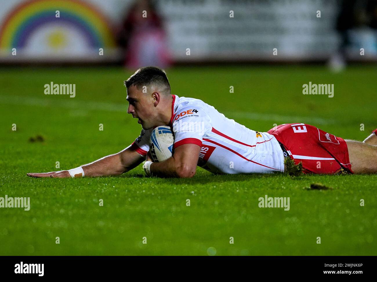St Helens' Lewis Dodd scores their side's first try of the game during ...