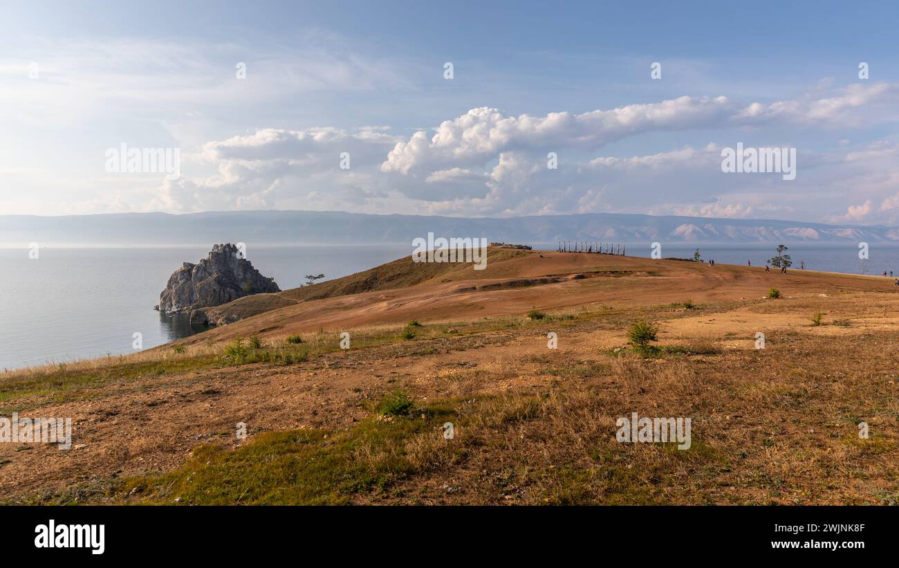 View of the sacred Shaman Rock and the blue Lake Baikal, Russia Stock ...