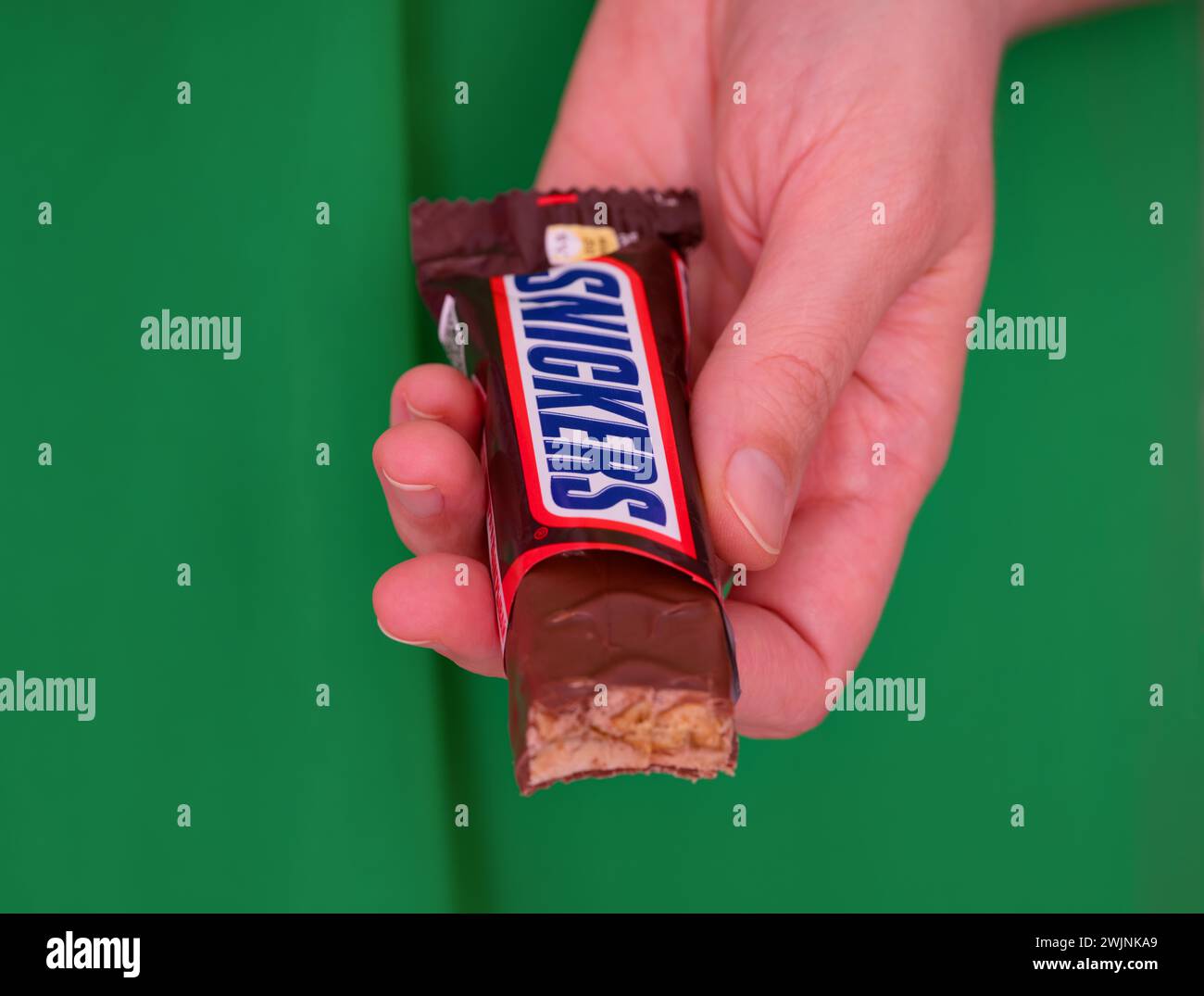 Tambov, Russian Federation - January 31, 2024 A woman holding an open ...