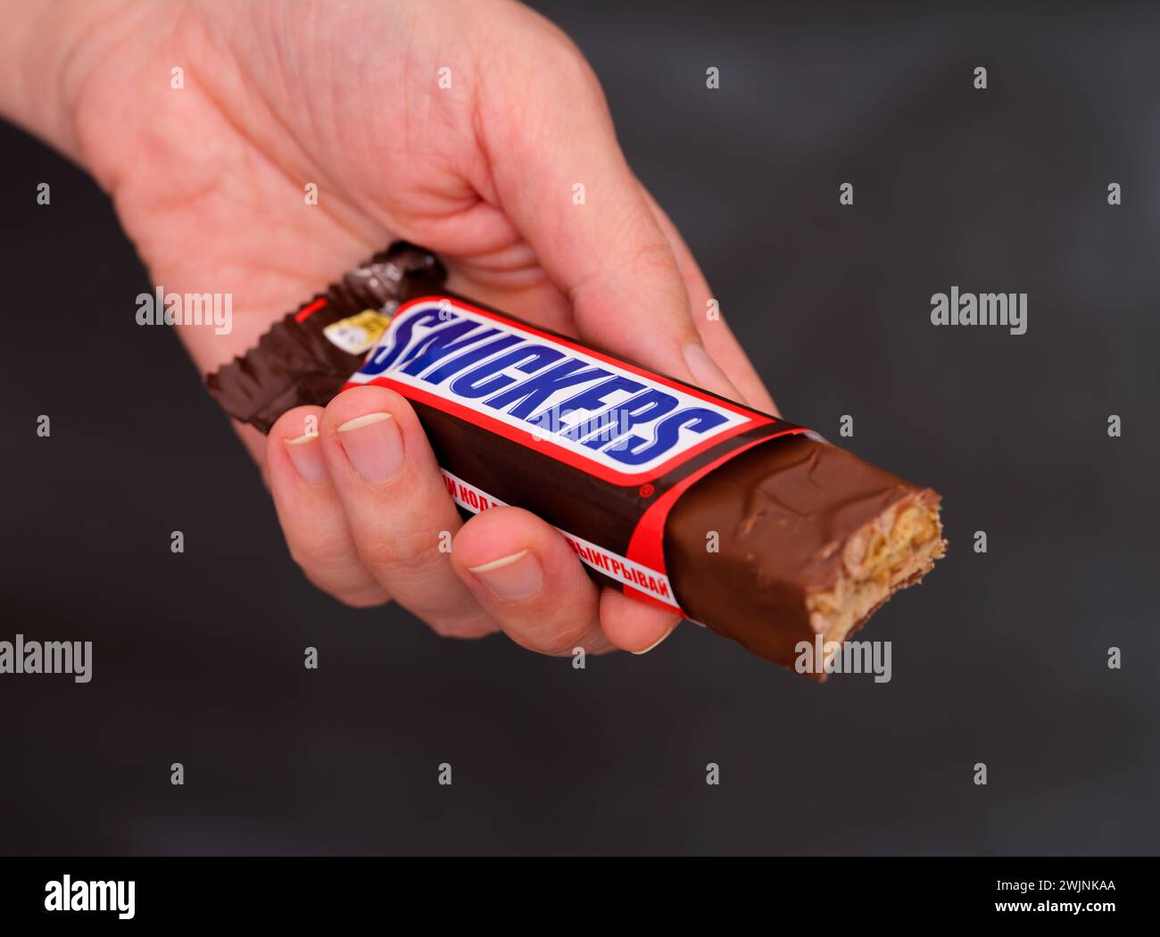 Black woman eating chocolate bar hi-res stock photography and images ...