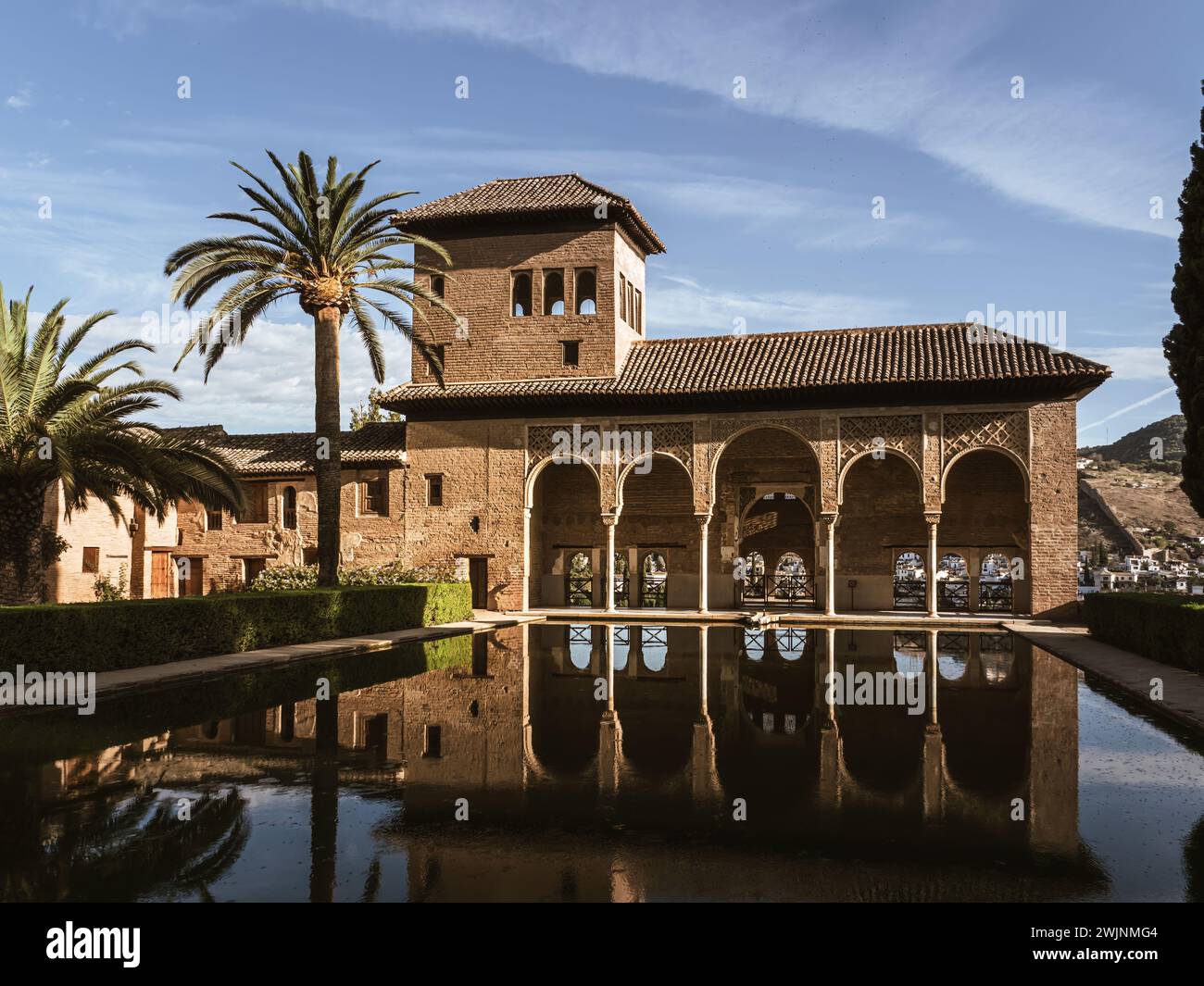 Buildings of the Alhambra Palaces in the El Partal part, reflection in ...