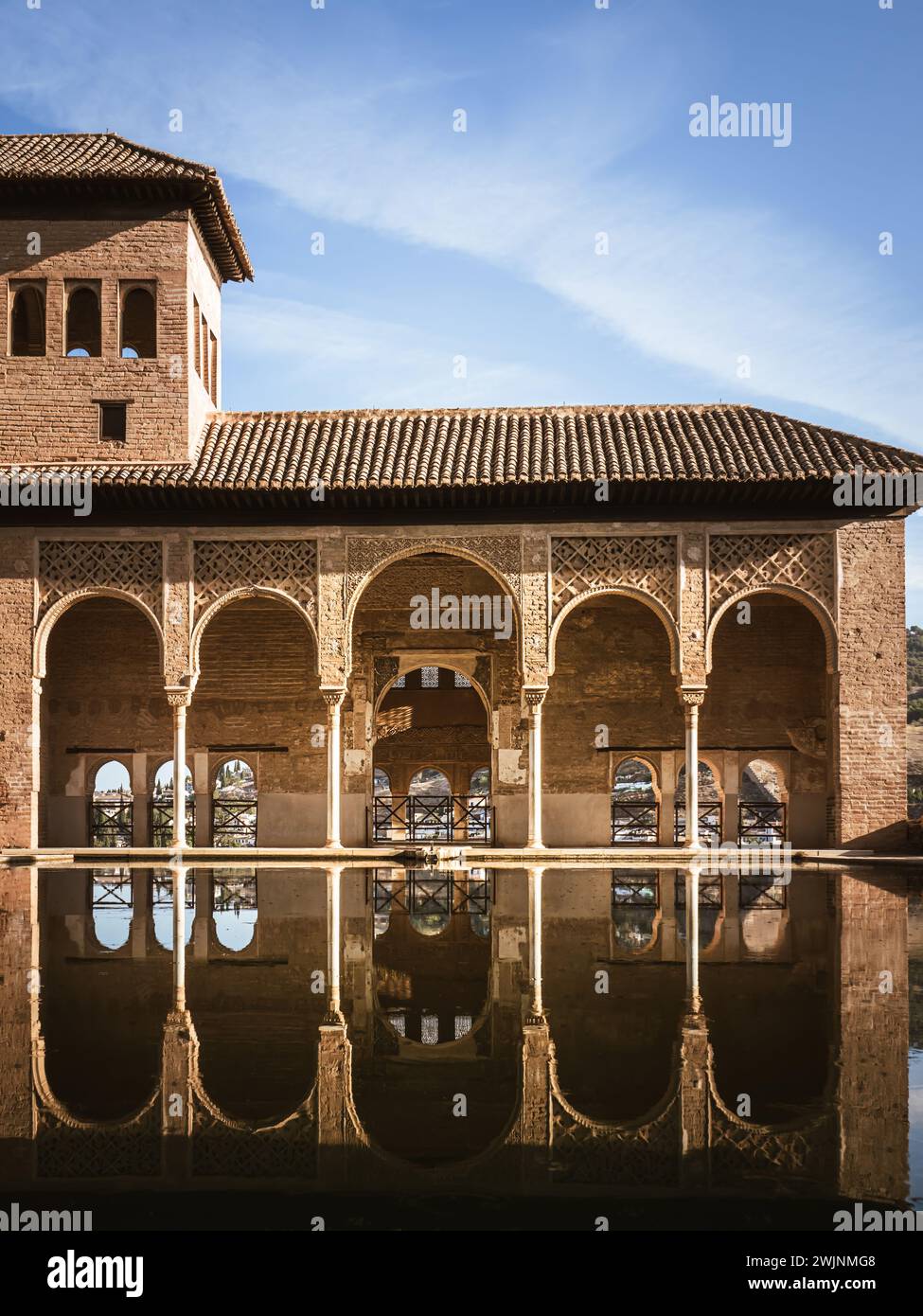 Buildings of the Alhambra Palaces in the El Partal part, reflection in ...