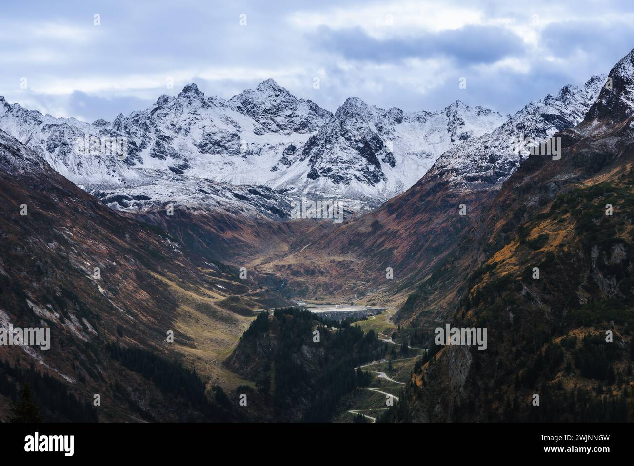 A Snow-capped mountain range with valley below Stock Photo - Alamy