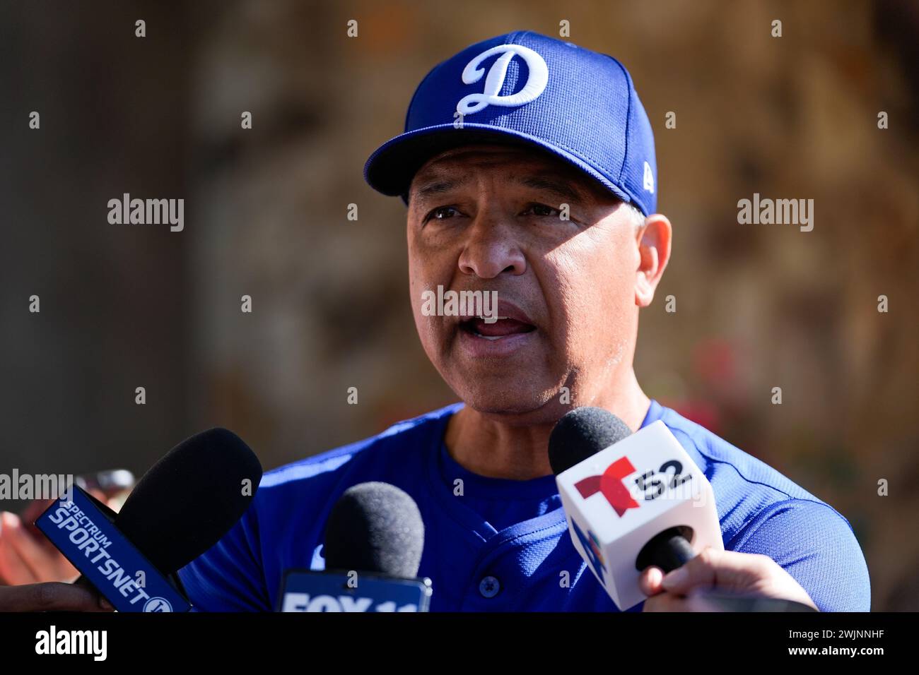 Los Angeles Dodgers manager Dave Roberts speaks to reporters during ...