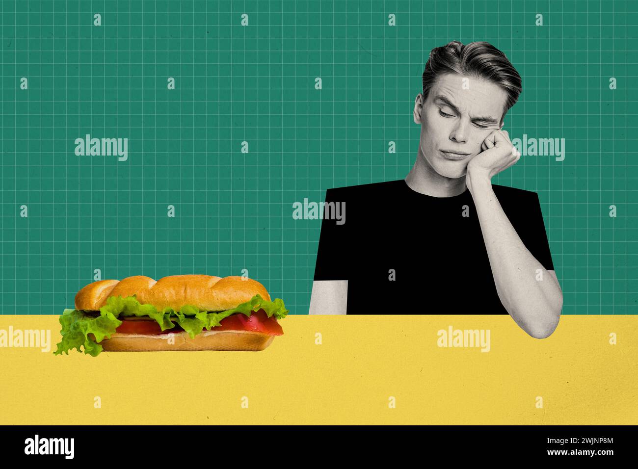 Photo picture of hungry funny guy doubts eat or not baguette huge ...