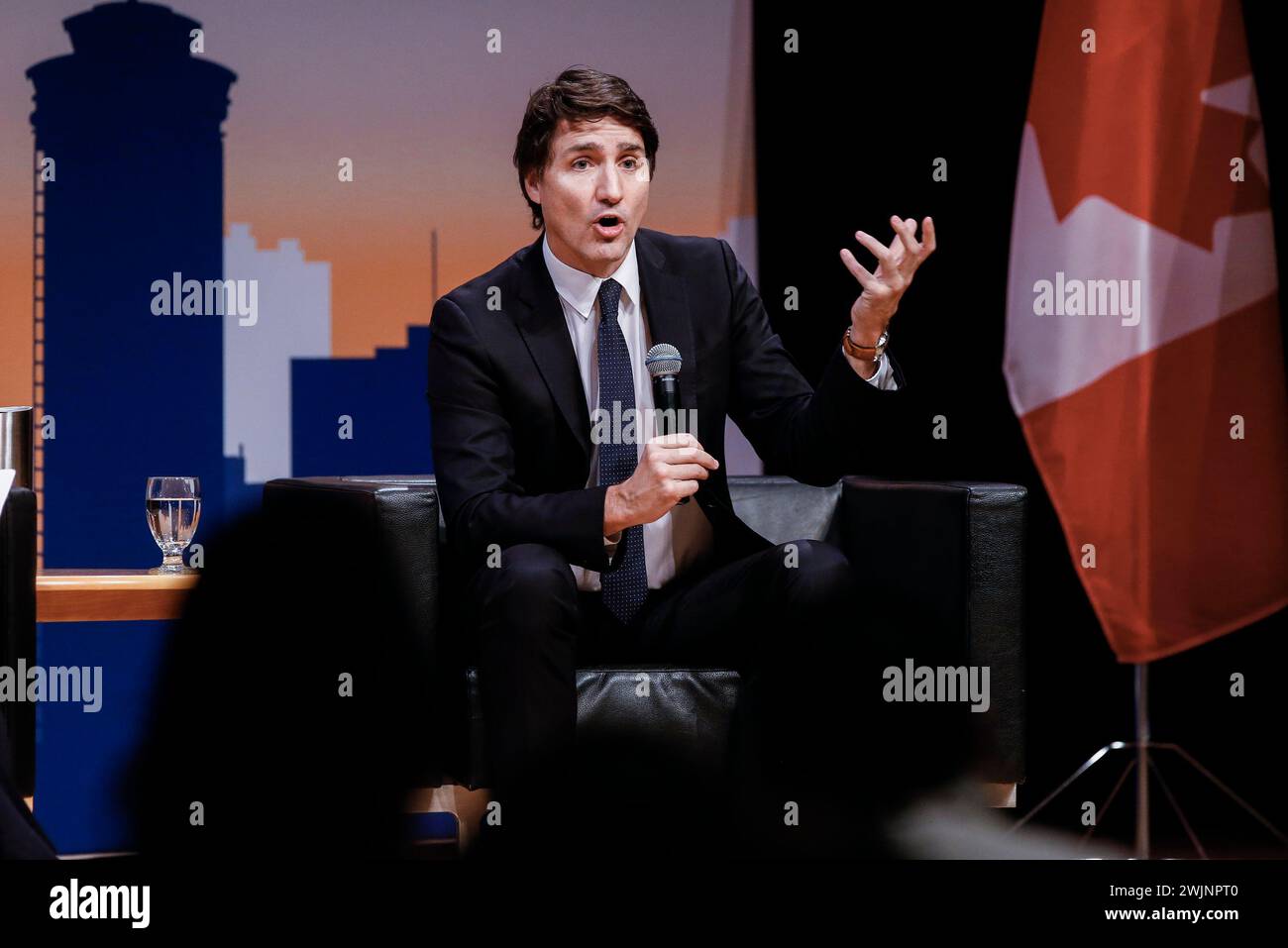 Prime minister Justin Trudeau, right, sits down for a fireside chat ...